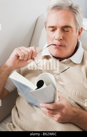 Close-up of a senior man dozing off Stock Photo - Alamy