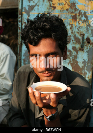 Young Indian Man Drinking Chai Tea in Old Delhi India Stock Photo - Alamy