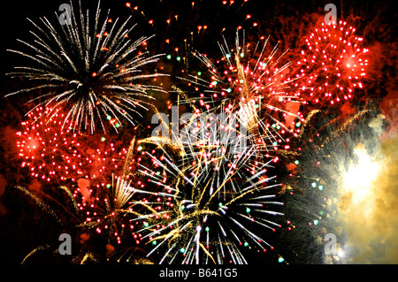 Grand finale of fireworks over dark background Stock Photo - Alamy