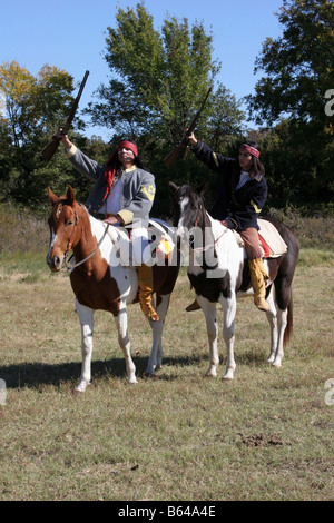 Two Apache Native American Indians on horseback in the bush Stock Photo ...