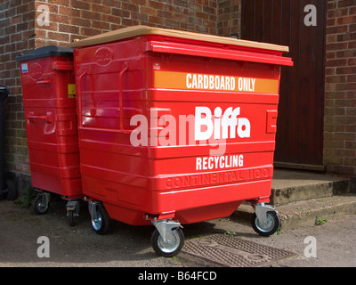 Large Red Industrial Recycling Bins Situated Behind Retail Units Stock ...