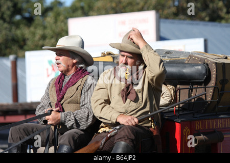Two men driving a stagecoach Stock Photo - Alamy