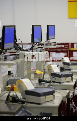 DHL distribution and sorting area for parcels in the UK Stock Photo - Alamy
