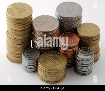 Columns of gold coins, piles of coins on working table, business ...