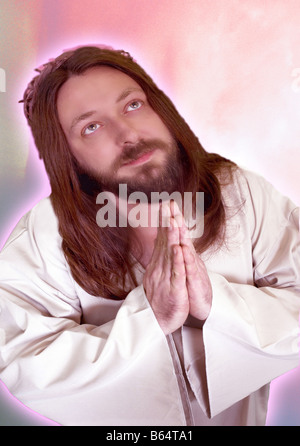 Jesus Christ praying and looking up to heaven Stock Photo - Alamy