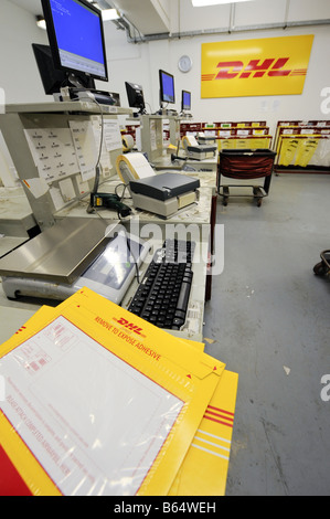 DHL distribution and sorting area for parcels in the UK Stock Photo - Alamy