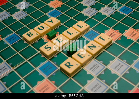 buy, sell, rent scrabble Stock Photo - Alamy