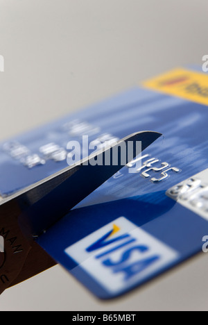 Cutting up or destroying credit cards Stock Photo - Alamy