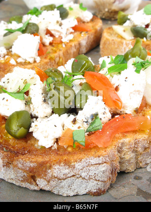 Maltese light meal of hobz-bi-zejt (bruschetta-style bread with oil ...