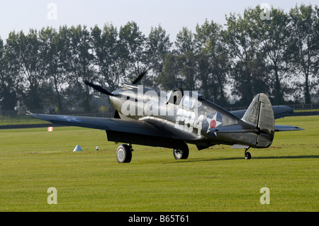 Curtiss P40B Warhawk Kittyhawk 1941 amongst a row of other ww2 planes ...