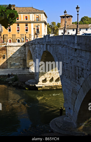 The Tiber island with ruins of a a roman bridge in Rome Stock Photo - Alamy