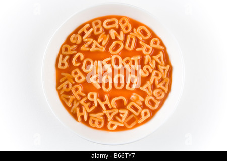 Alphabet spaghetti in tomato sauce as a background and texture Stock ...