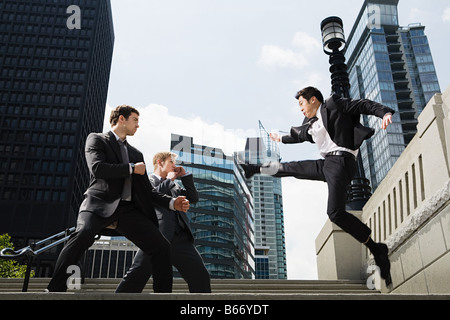 Group of people fighting Stock Photo - Alamy