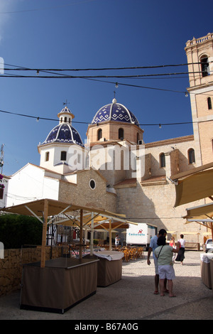 Local market in a square in Altea. Behind is the church "Iglesia de la ...