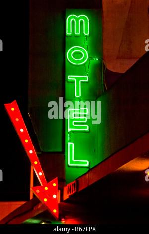 Neon motel sign with arrow at night in California, USA Stock Photo - Alamy