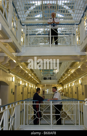 Prison officer on the wing Stock Photo - Alamy