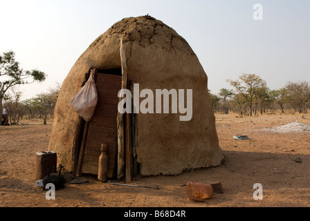 Traditional village huts built from mud and dung at the Himba Oase ...
