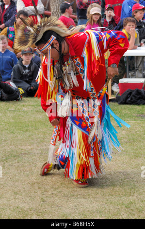 First Nations dancer in traditional dress, at a pow wow ceremony ...