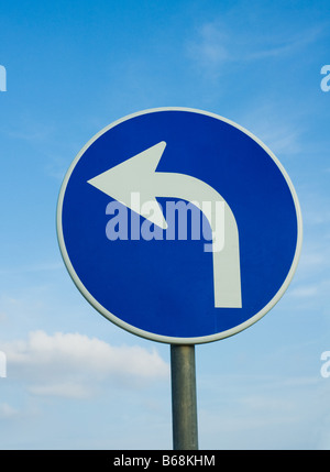 left turn traffic sign over blue sky Stock Photo - Alamy