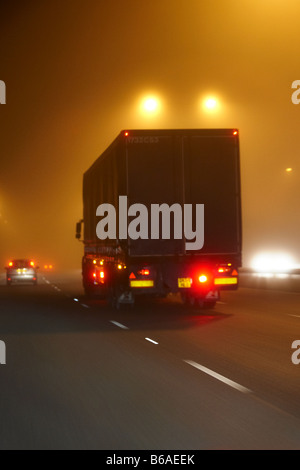 HGV on Motorway at Night Time Stock Photo - Alamy