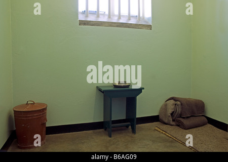 Prison cell of Nelson Mandela in the former prison on Robben Island ...