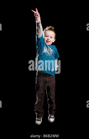 little boy making peace sign Stock Photo - Alamy