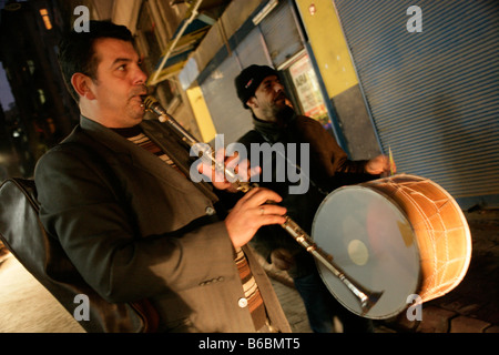 Gypsy musicians play the zurna and davul while vlachs enjoy Lent's ...