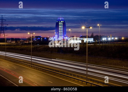 THE M6 TOLL ROAD MOTORWAY WITH LIGHT TRAFFIC AND TOLL BOOTHS AT WEEFORD ...