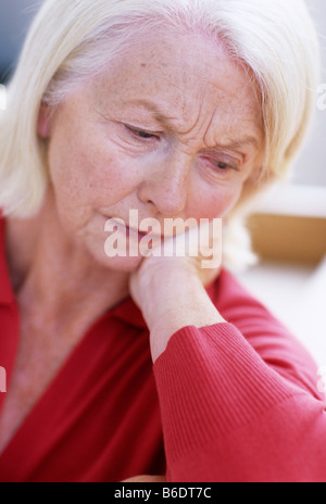 Depressed woman. 63 year old woman looking unhappy Stock Photo - Alamy