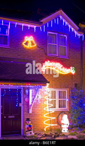 Residential House At Night Lit Up illuminated With Christmas Lights ...