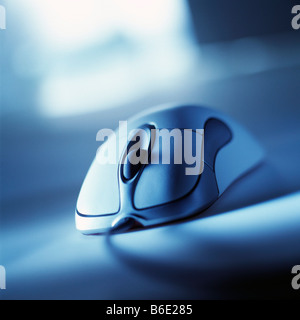 Computer mouse with a scroll wheel. Sensors on the inside of the mouse ...