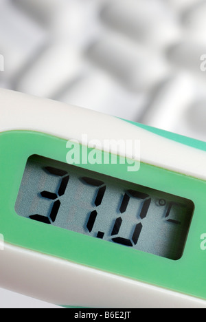 digital thermometer displaying 37 degrees celsius Stock Photo - Alamy