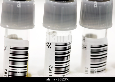 Medical sample tubes labelled with barcodes Stock Photo - Alamy