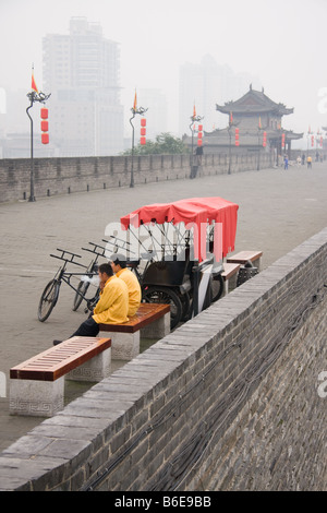 Rickshaws on Xian City Wall, military defence fortifications built ...
