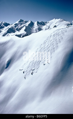 skiing on fresh snow at winter season at beautiful sunny day Stock ...