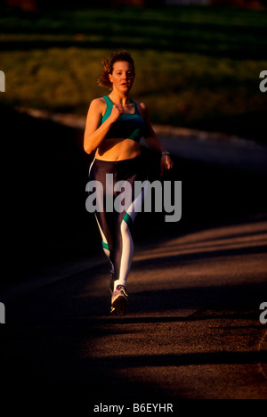 Young woman runner Stock Photo - Alamy
