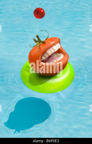 pool floating tomato Stock Photo - Alamy