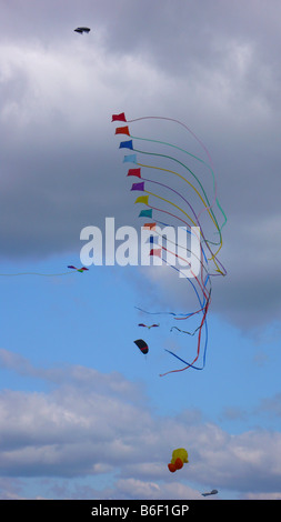 Various kites flying on the blue sky in the kite festival Stock Photo ...