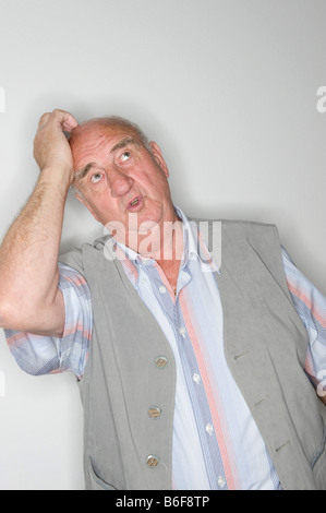 Old man scratching his head Stock Photo: 21234552 - Alamy