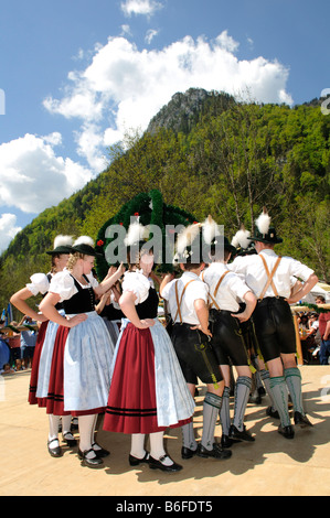 German folk dancers wearing traditional lederhosen costumes. Grand ...