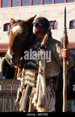 Comanche Native American Indian posing with his horse at the Stock ...