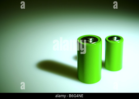 close up of batteries and green recycling symbol Stock Photo - Alamy