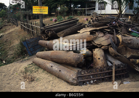 War Waste and Scrap Metal of US Cluster Bombs or Bomb Casings Piled up ...
