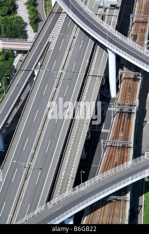 A Rail over road bridge with a "T" junction showing warning signs for a ...