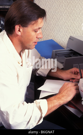 contemplative man writing a letter Stock Photo - Alamy