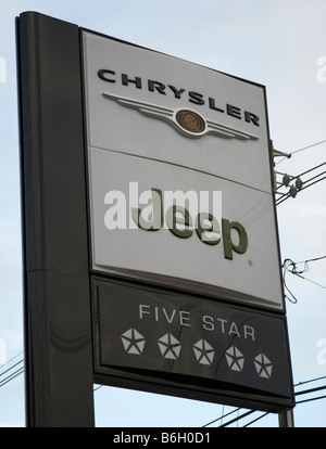 Chrysler automobile dealership sign Stock Photo - Alamy