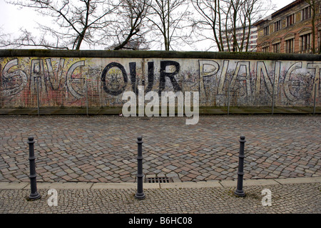 save our planet eco graffiti berlin wall niederkirchnerstraße Stock ...