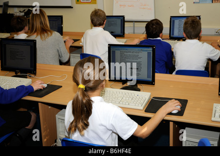 School pupils using computers in a secondary school in the UK Stock ...