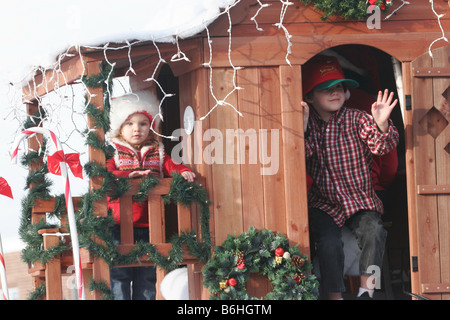 Christmas parade float with kids in nativity scene. Editorial-use only ...