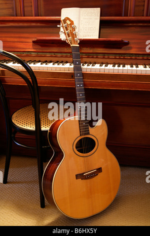 Individually designed flat top acoustic guitar with oval sound hole and ...